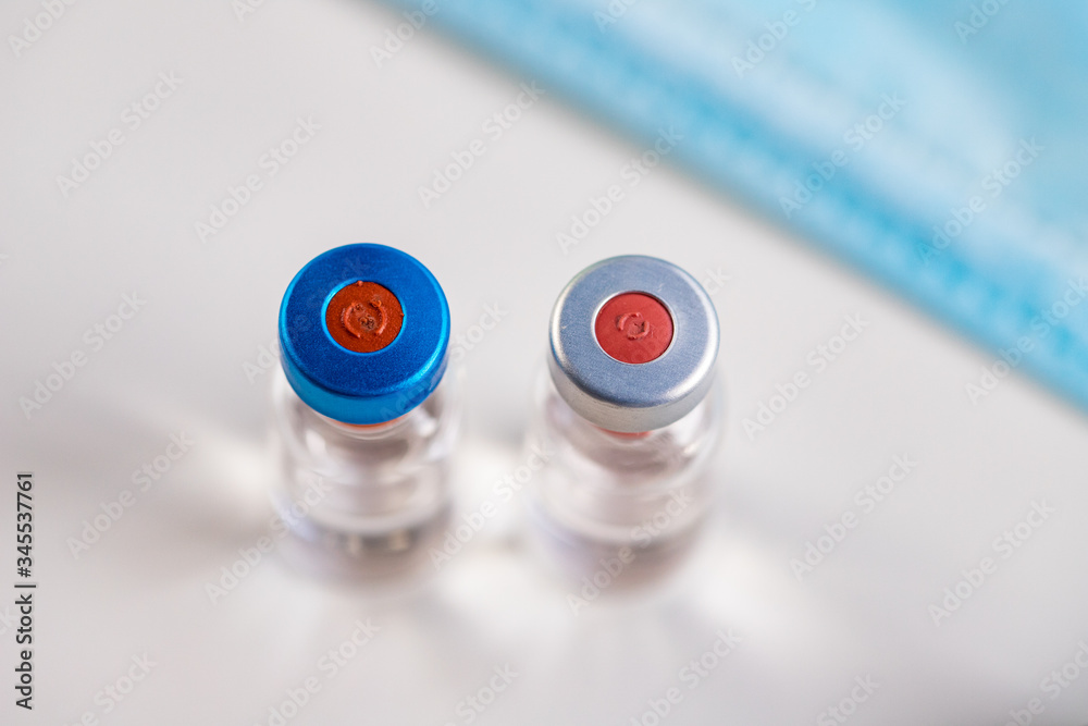 close up on vaccine and medical syringe Stock Photo | Adobe Stock
