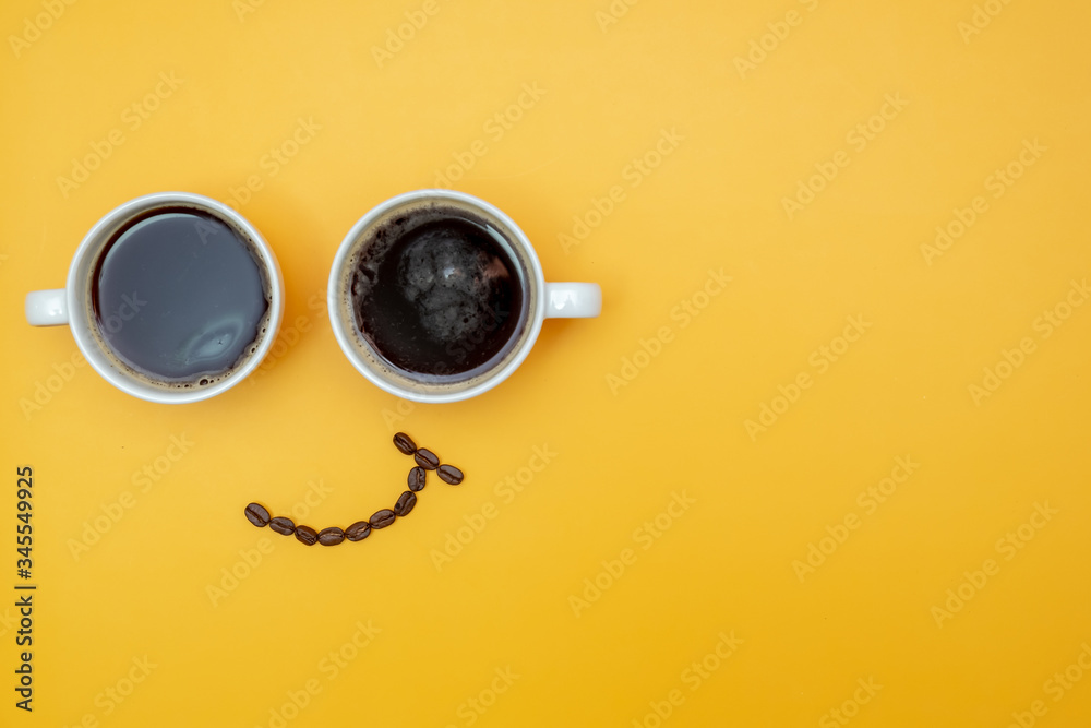 smile coffee (Smiley look made from two cups of coffee and coffee beans ...