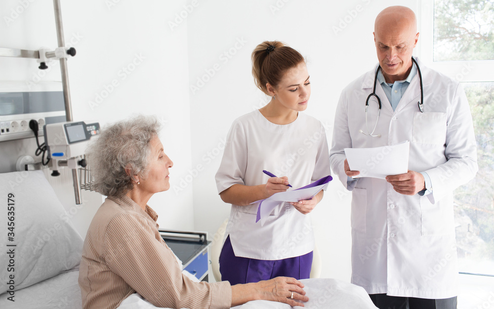 Medical Caring about senior people. elderly patient lying in a hospital ...