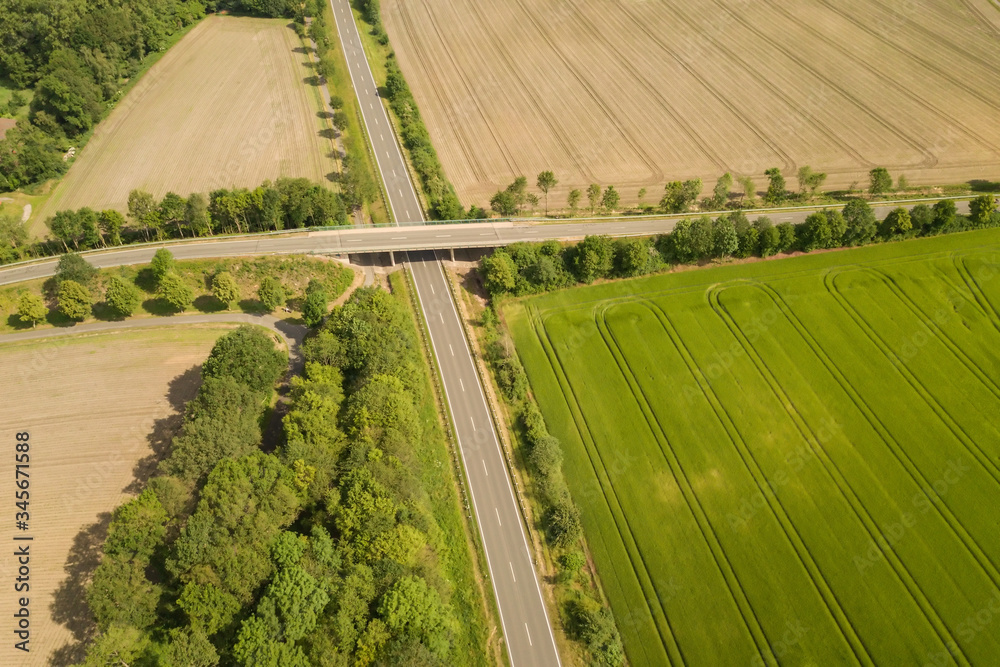 Bridge passing road in countryside in Germany Stock Photo | Adobe Stock