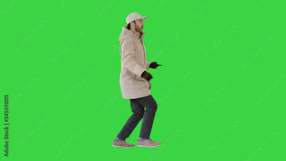 Hip-hop man singing rap, walking and making gestures on a Green Screen ...