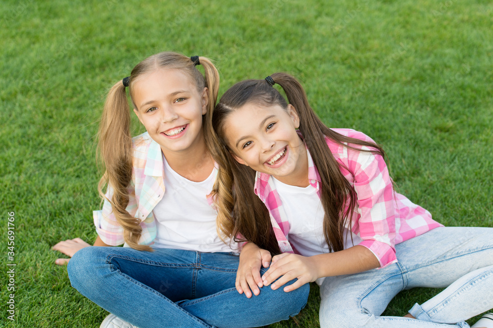 Have fun. Happy kids relaxing outdoors. Joyful friends. Sisterhood and ...