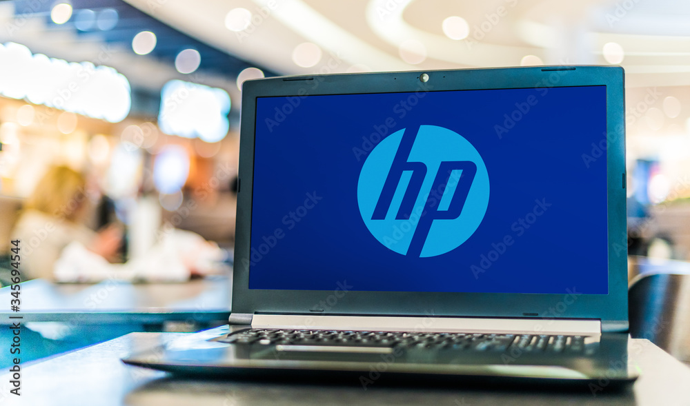 Laptop computer displaying logo of HP Stock Photo | Adobe Stock