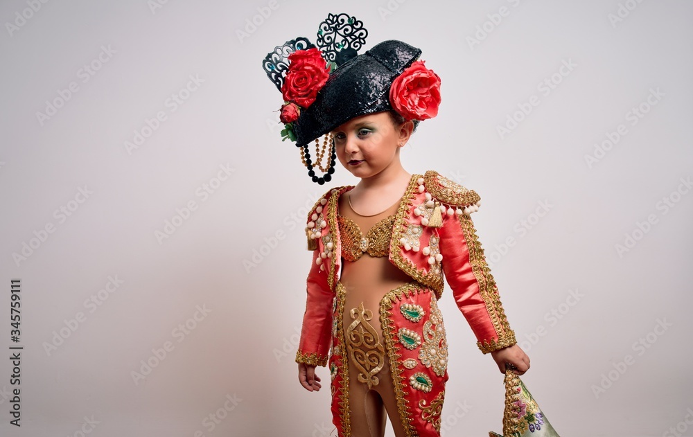 Young little caucasian kid girl wearing bullfighter traditional folkore ...