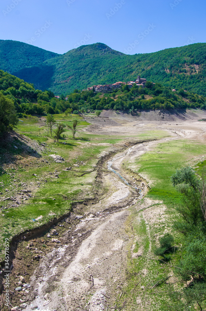 drought and temperature rise catastrophe, dry river and town without ...