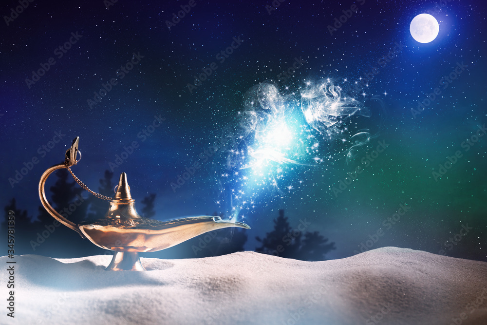 Genie appearing from magic lamp of wishes. Fairy tale Stock Photo ...