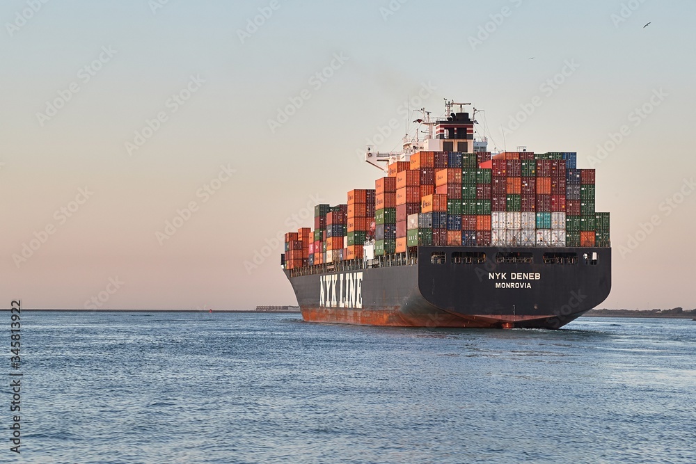 ROTTERDAM, THE NETHERLANDS - CIRCA 2019: Container ship heading out to ...