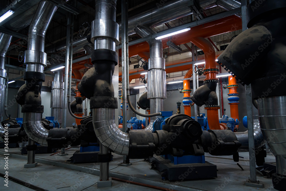 A engineer under checking the industry cooling tower air conditioner is ...