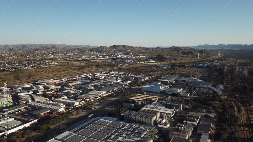 4K bright summer morning aerial video of Namibia Brewery beer factory ...