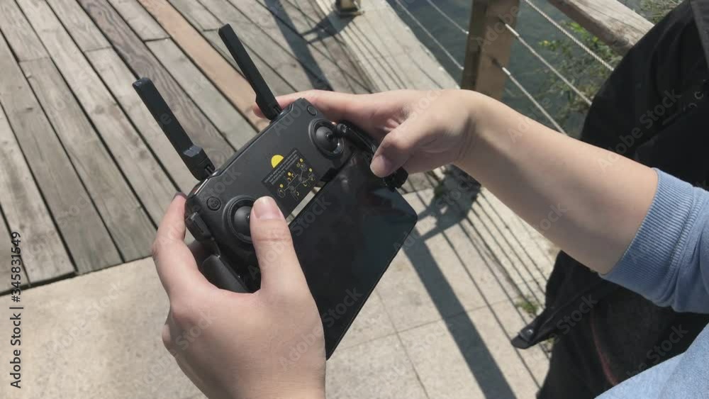 The close up look of a man teach another man how to operating the ...