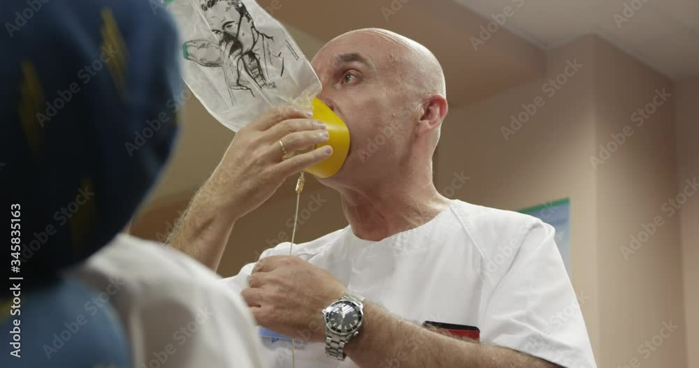 MS Teacher in aviation cabin crew training class showing use of oxygen ...