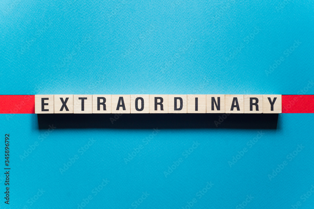 Extraordinary word concept on cubes Stock Photo | Adobe Stock
