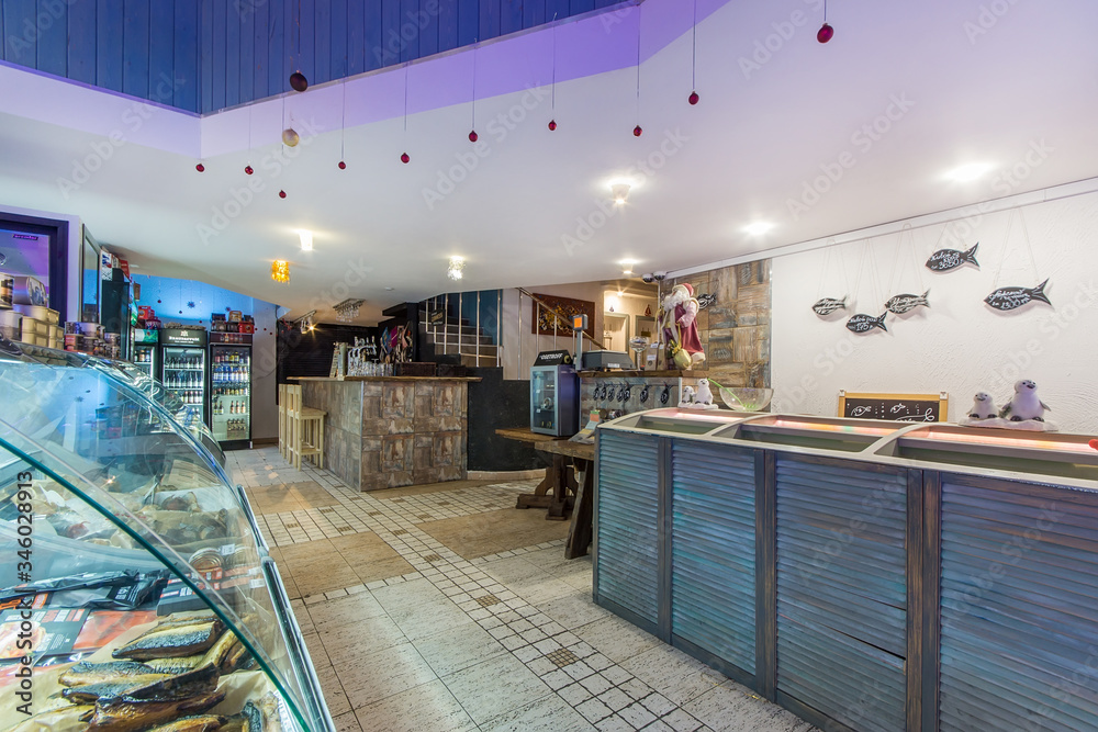 The sea food store with the bar counter. Fish counter displays ...