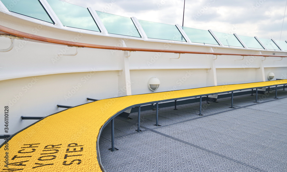 Observation deck on expedition vessel or cruiseship with railing and ...