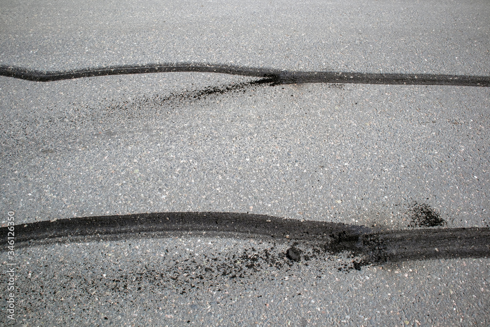 car tyre skid marks on road Stock Photo | Adobe Stock