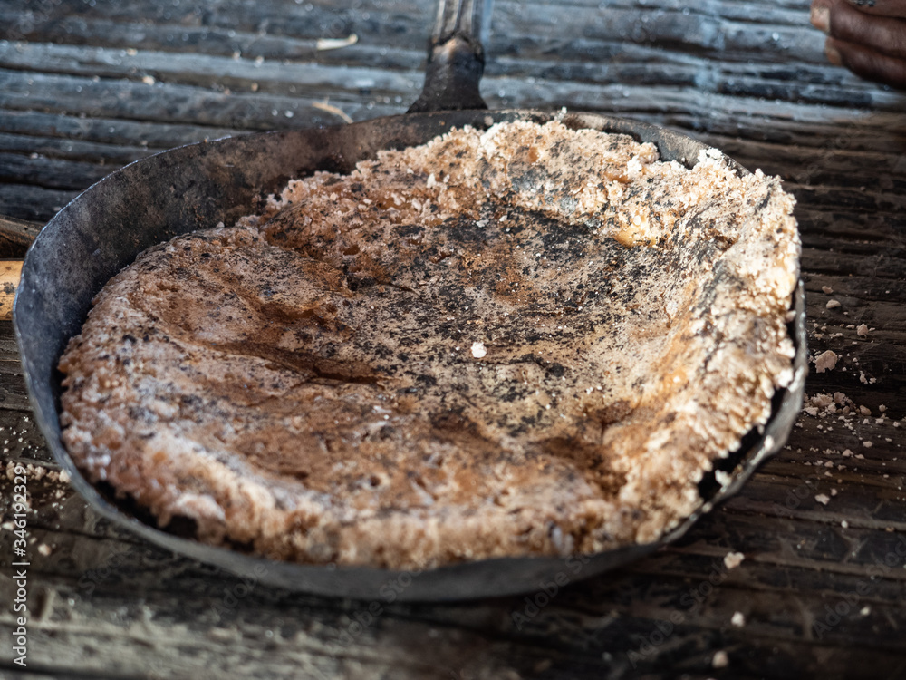 PAGWI, SEPIK RIVER, PAPUA NEW GUINEA, traditional food SAGO cooked in ...