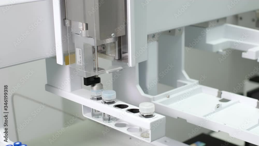 Automatic system to clean the syringe by using solvent. Syringe moves ...