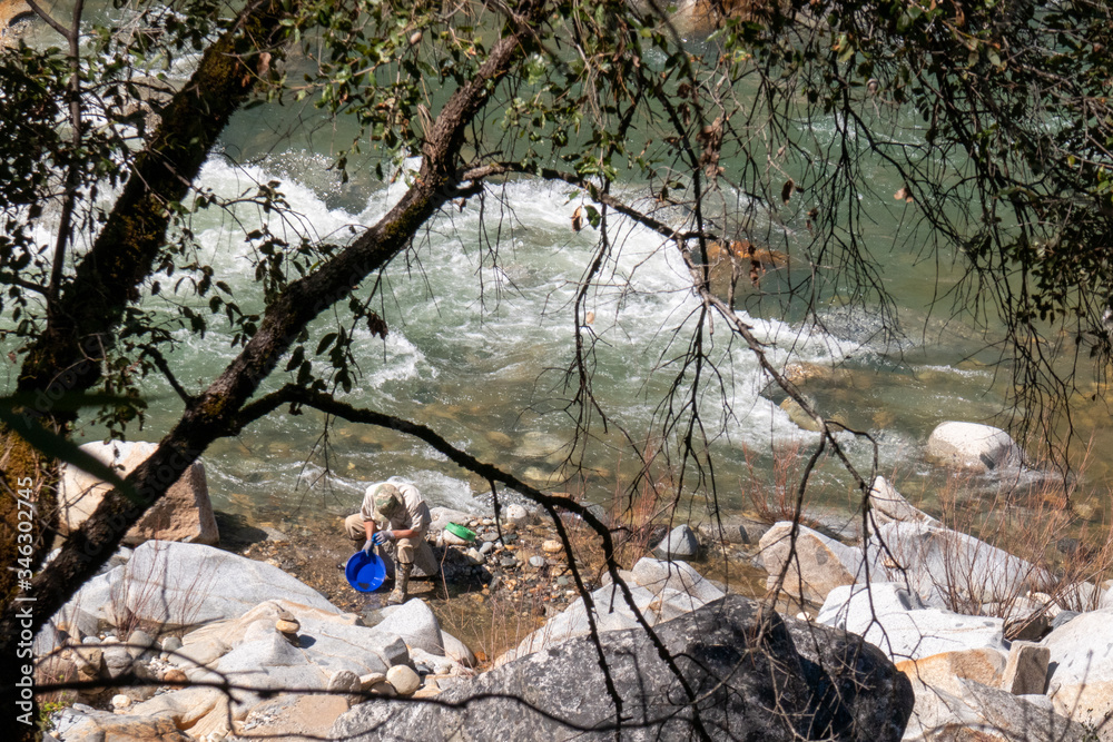 Gold panning in the Sierra Nevada Mountains Stock Photo | Adobe Stock