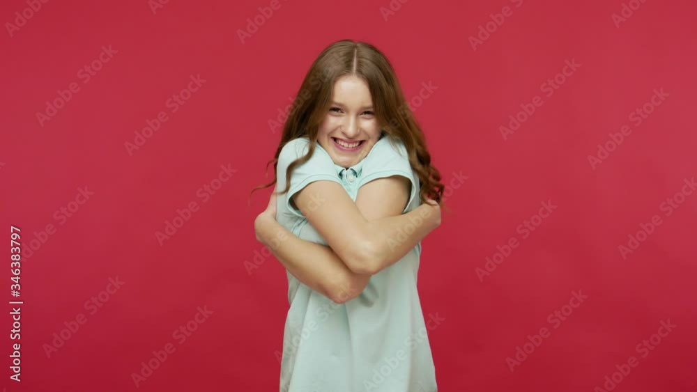 Come here into my arms! Friendly joyful young woman in polo t-shirt ...