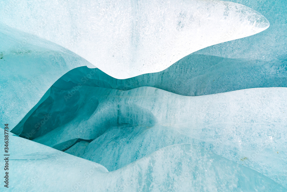 Breaking ice in glacier, ice wall texture taken from a natural glacier ...