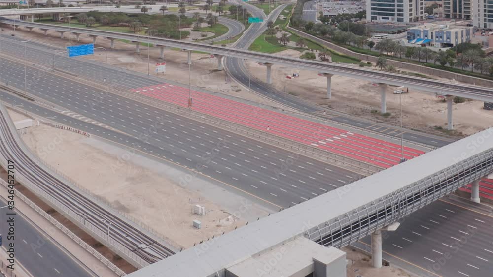 Aerial view of empty highway and interchange in Dubai after epidemic ...