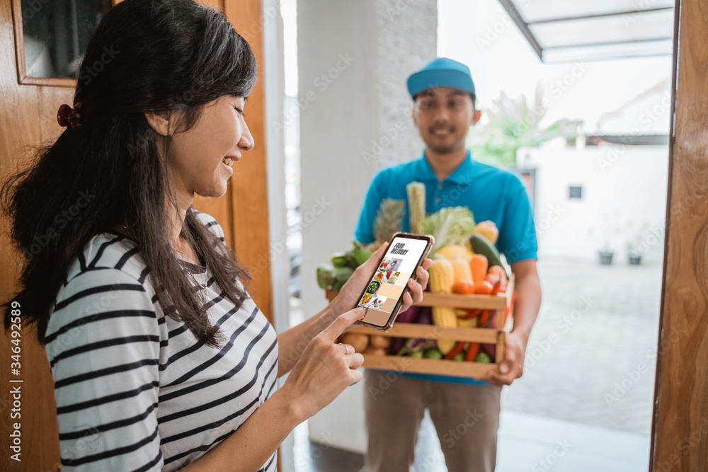 grocery store ordering via smartphone apps. close up hand holding ...