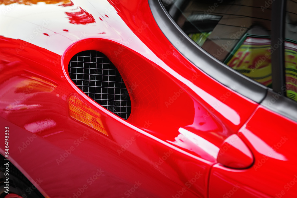 Details of automotive design: Red hypercar air intake Stock Photo ...