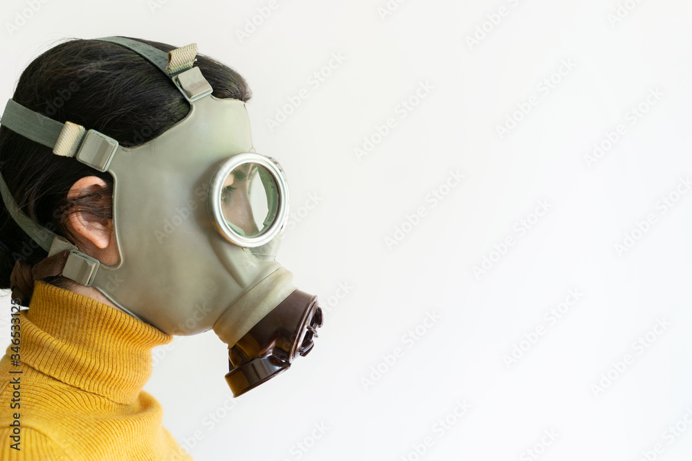 Horizontal side view of woman with gas mask at home isolated on white ...