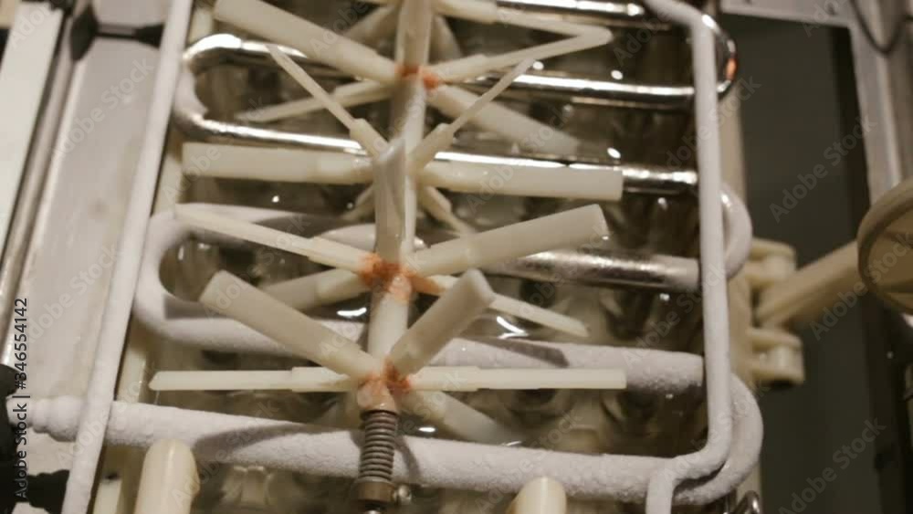 Video Stock automatic ice-making plant close-up. A zigzag frost-frozen ...