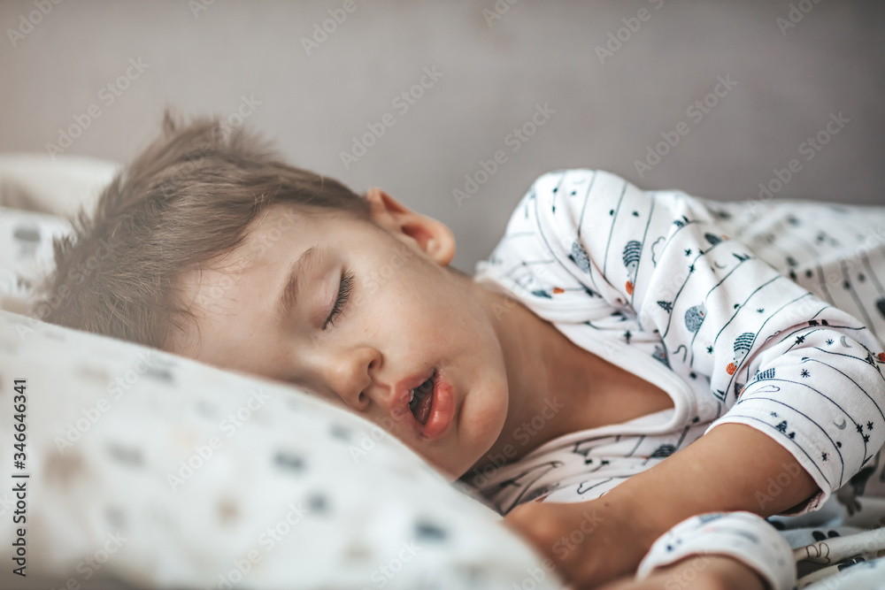 Fotografia do Stock: Photo of baby boy sleeping. His favorite napping ...