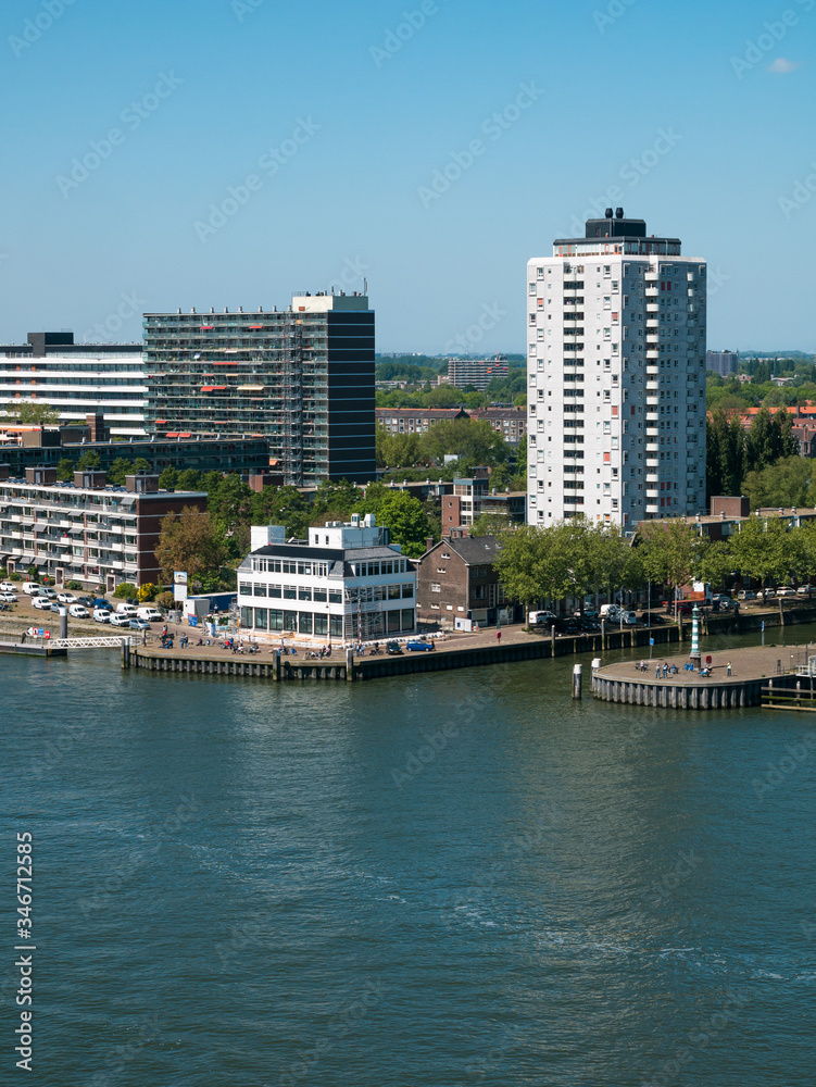 Rotterdam, Netherlands - May 07, 2020: view on the cargo port buildings ...