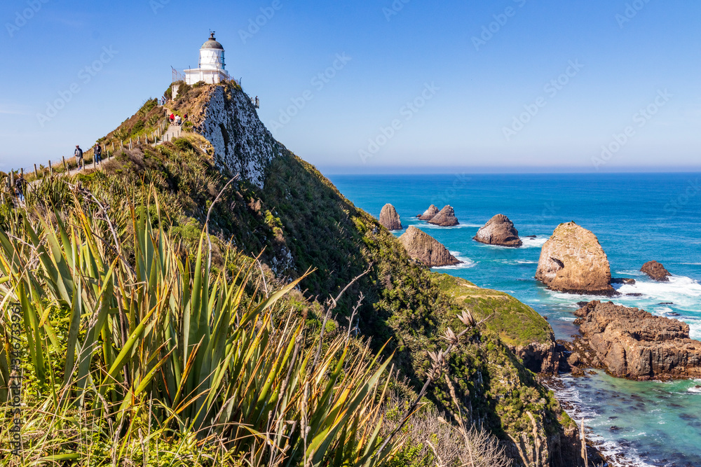 Nugget point. New Zealand. 03-14-2020. Lighthouse at Nugget Point in ...