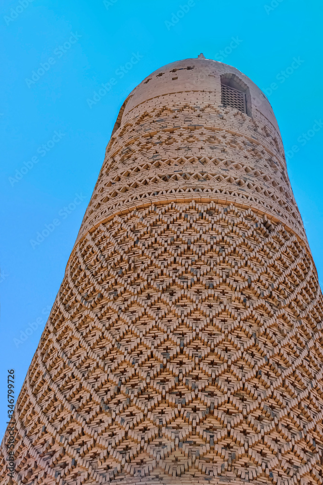 The Emin Minaret made made with textured bricks that are carved into ...