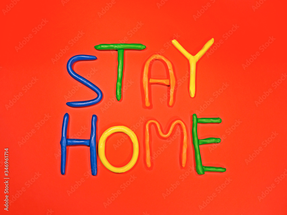 Stay home plasticine colorful letters. Red background. Stay home text ...