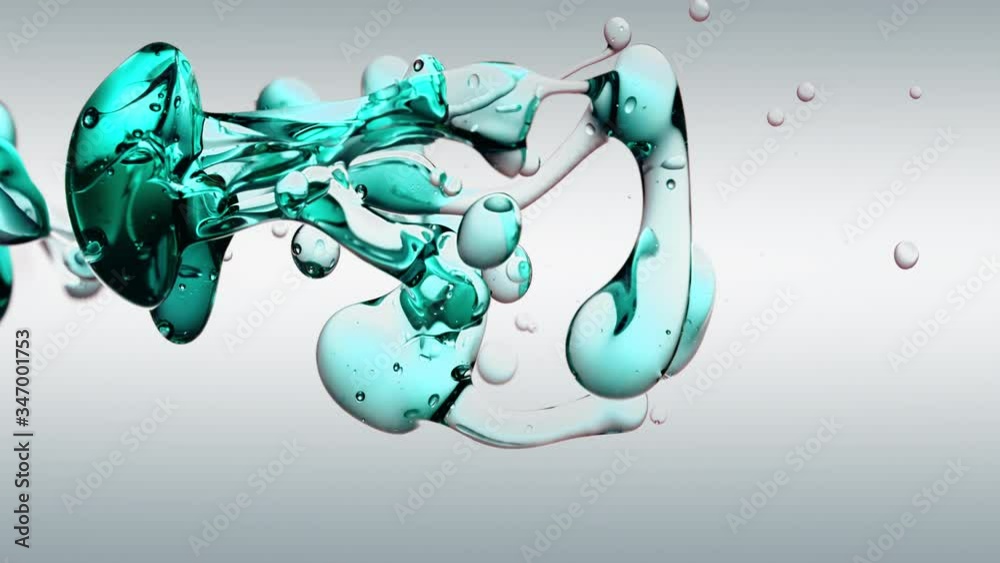 transparent petrol, green blue oil bubbles and fluid shapes in purified ...