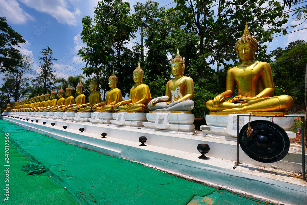 Wat Phra Phutthabat Namthip famous temple with many big white Buddha ...
