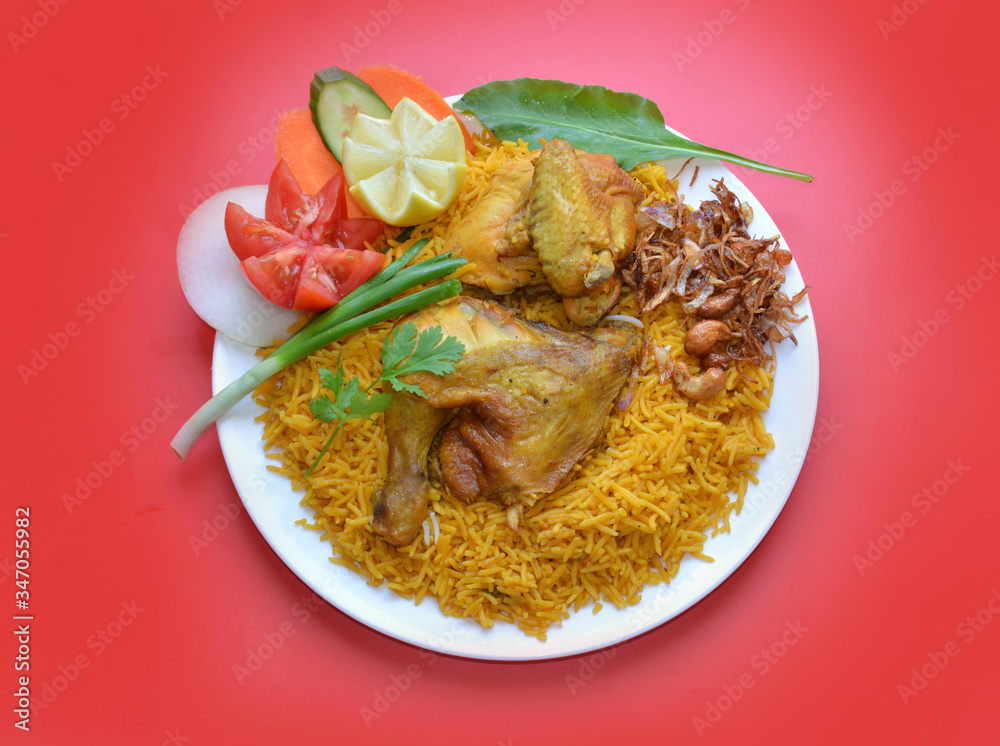 Chicken Mandi rice, cooked rice, Manthi, yellow rice Stock Photo ...