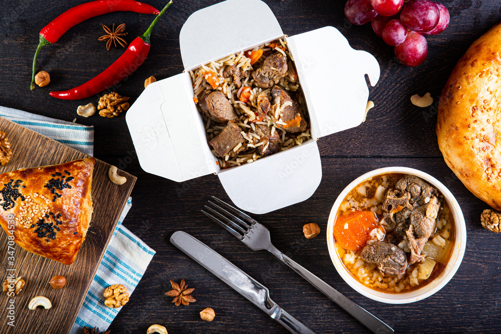 The concept of middle East cuisine. Assorted Uzbek food set, pilaf ...