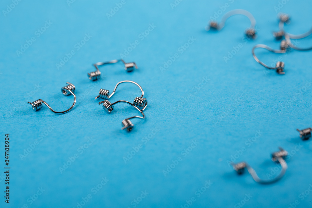 orthodontic springs for closing gaps in the treatment of tooth ...