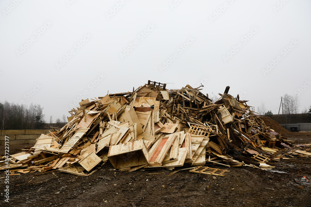 pile of garbage from wood at a landfill Stock Photo | Adobe Stock