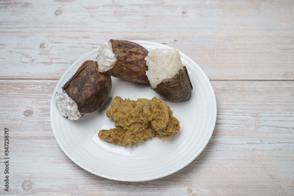 Glutinous rice steamed cooked with coconut milk in pitcher plants known ...