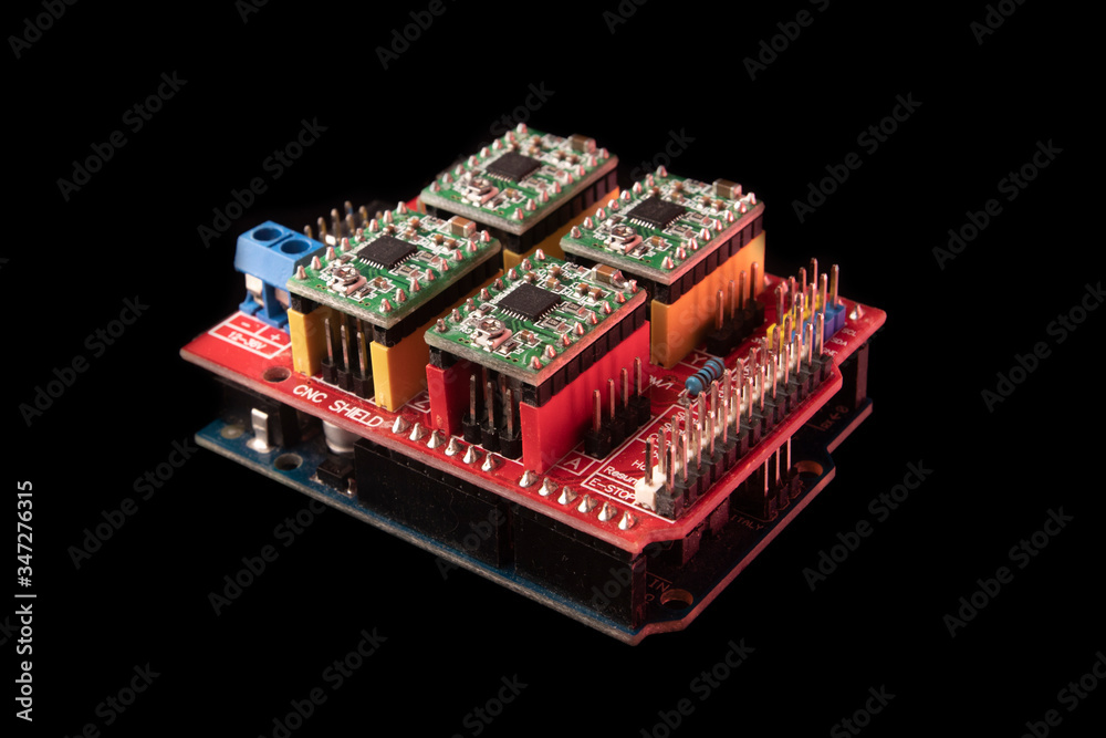CNC shield. Arduino UNO board on black background, close up ...
