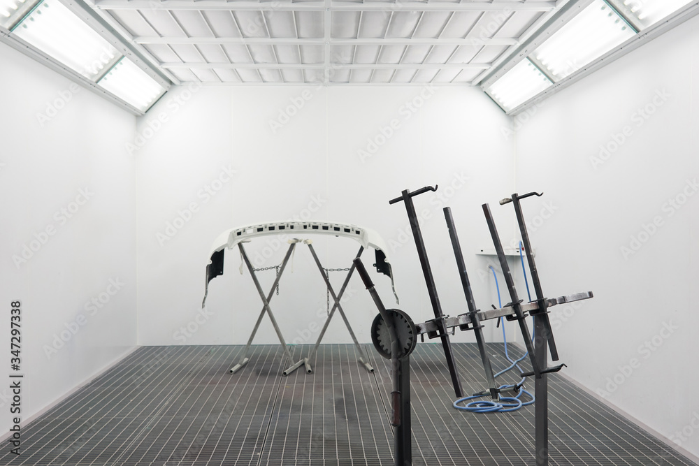 Car bumper after painting. Drying parts of the automobile in spray ...