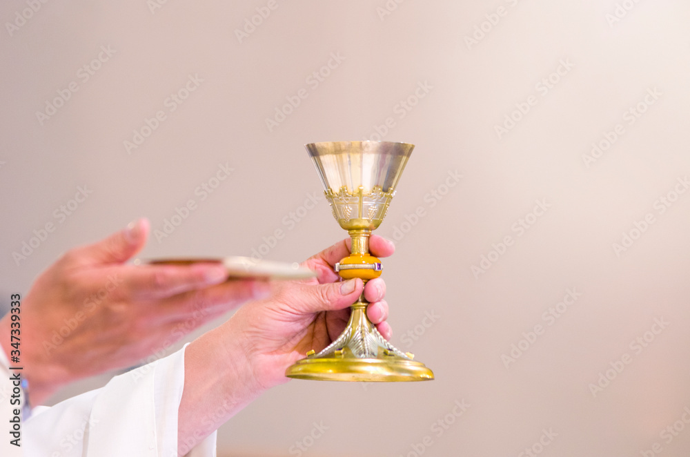 chalice with wine, blood of christ, and pyx with bread, body of christ ...