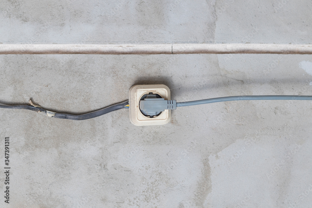 Electric sockets light works mounting and installation on plaster wall ...