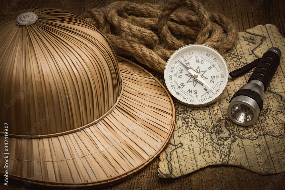 helmet on the background of an old colonial map with a compass Stock ...