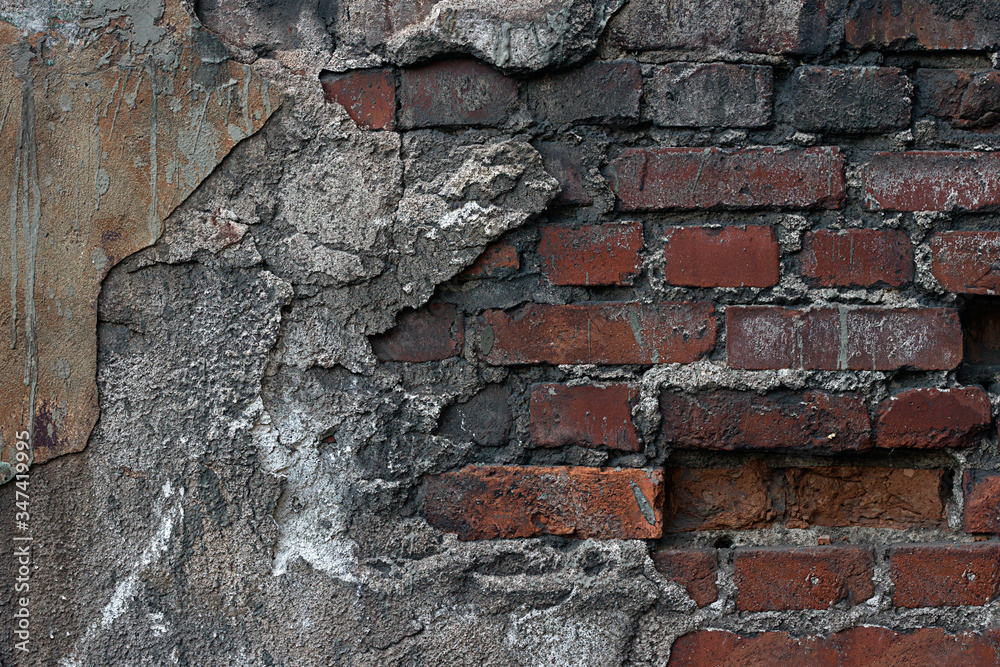 Texture of an old brick wall with crumbling cladding. Material for the ...