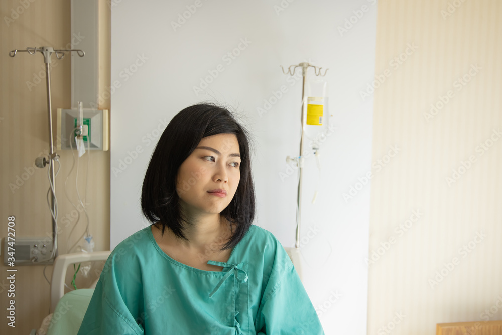 Asian woman sit with a sad face. The eyes were absent in the patient's ...