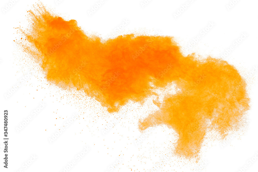 Orange powder dust particles explosion on white background.Orange dust ...