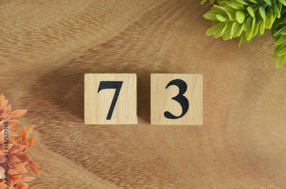 Number 73, Rating, Award, Design with number cube colorful stone in ...